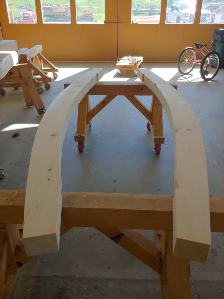 TimberHomes Prepares Another Curved Entry Roof